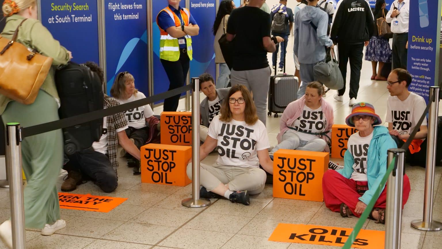 BREAKING | Just Stop Oil supporters block departure gates at major UK ...